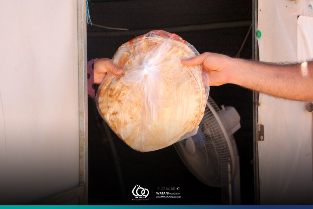 Providing bread as a basic food for the residents of WATAN Model II ...